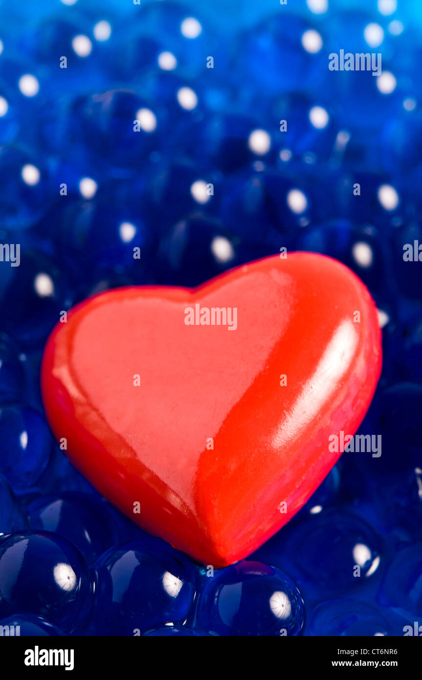 heart shape on blue background, love concept Stock Photo - Alamy