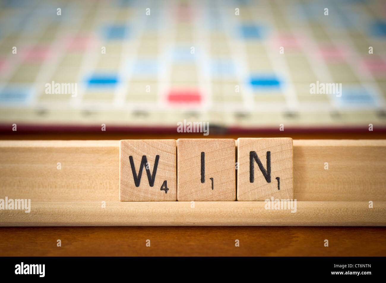 win word spelled with scrabble tiles Stock Photo - Alamy