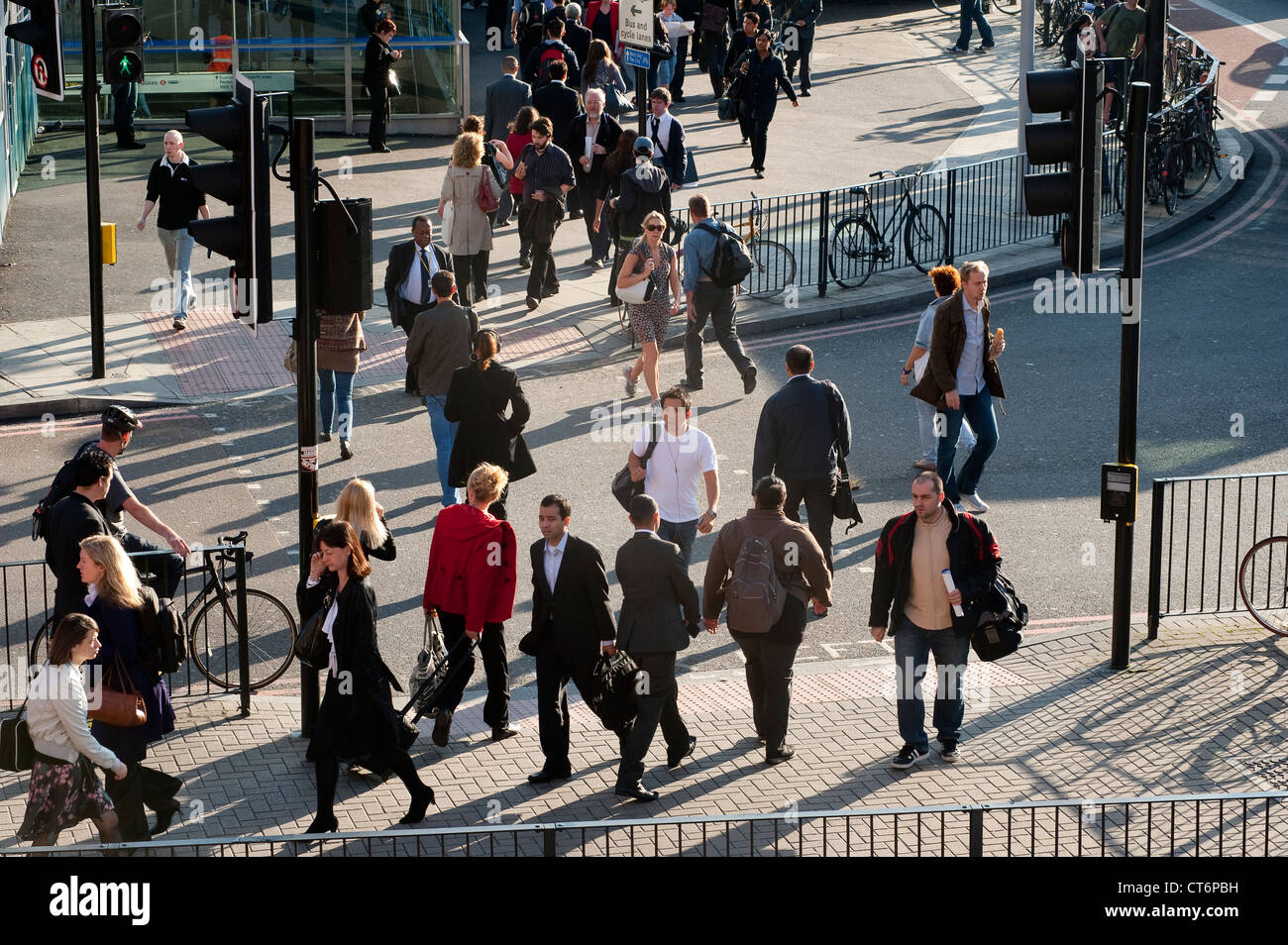 Busy scene outside the entrance to Kings Cross Railway Station, London ...