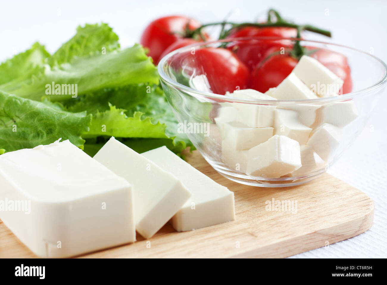 Slices of feta cheese, large and small Stock Photo - Alamy