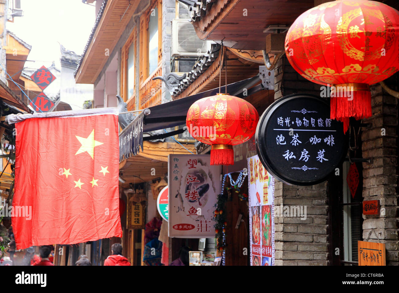 A Chinese flag and red lanterns in Fenghuang, Hunan Province Stock ...
