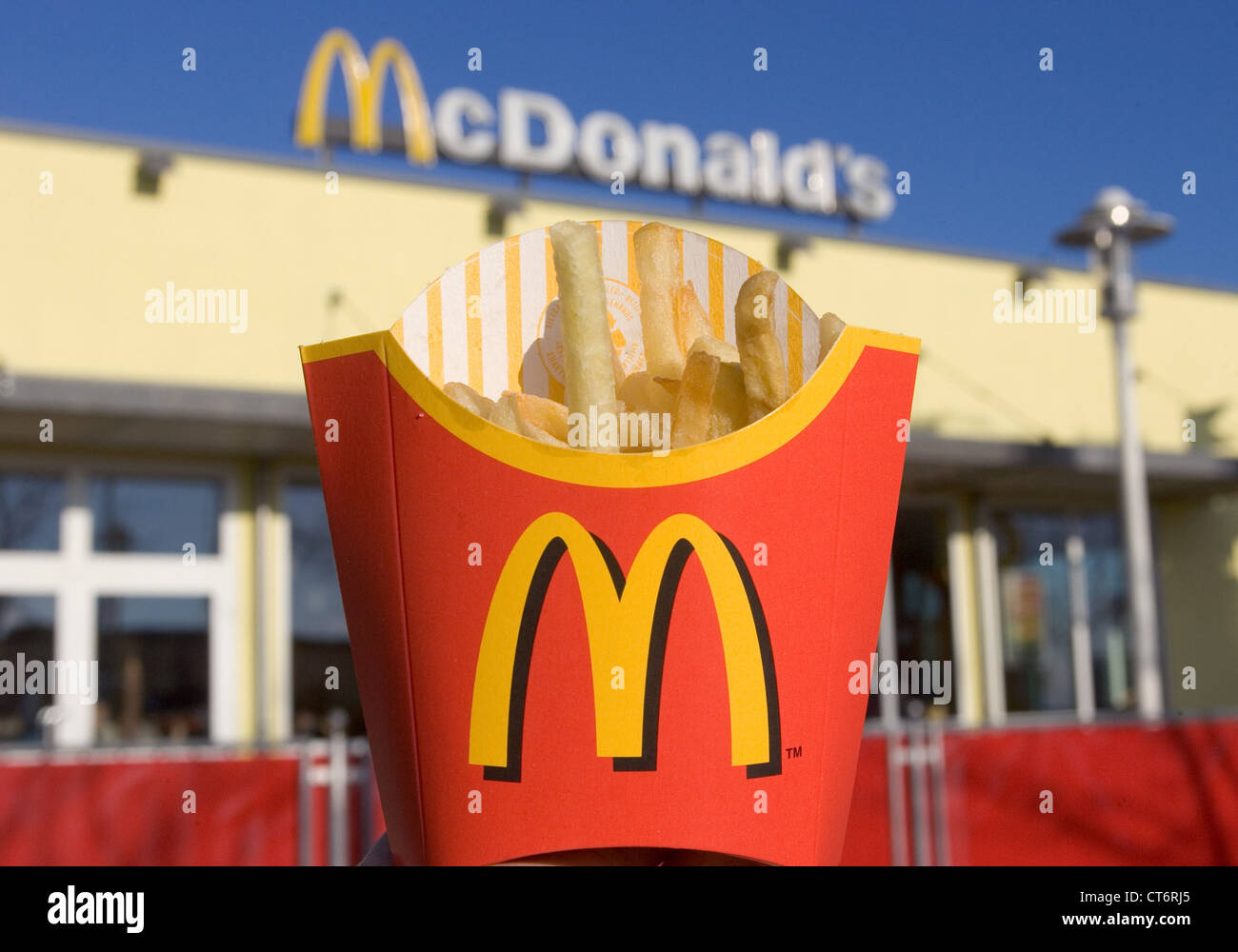 Berlin, in front of McDonald's french fries logo Stock Photo - Alamy