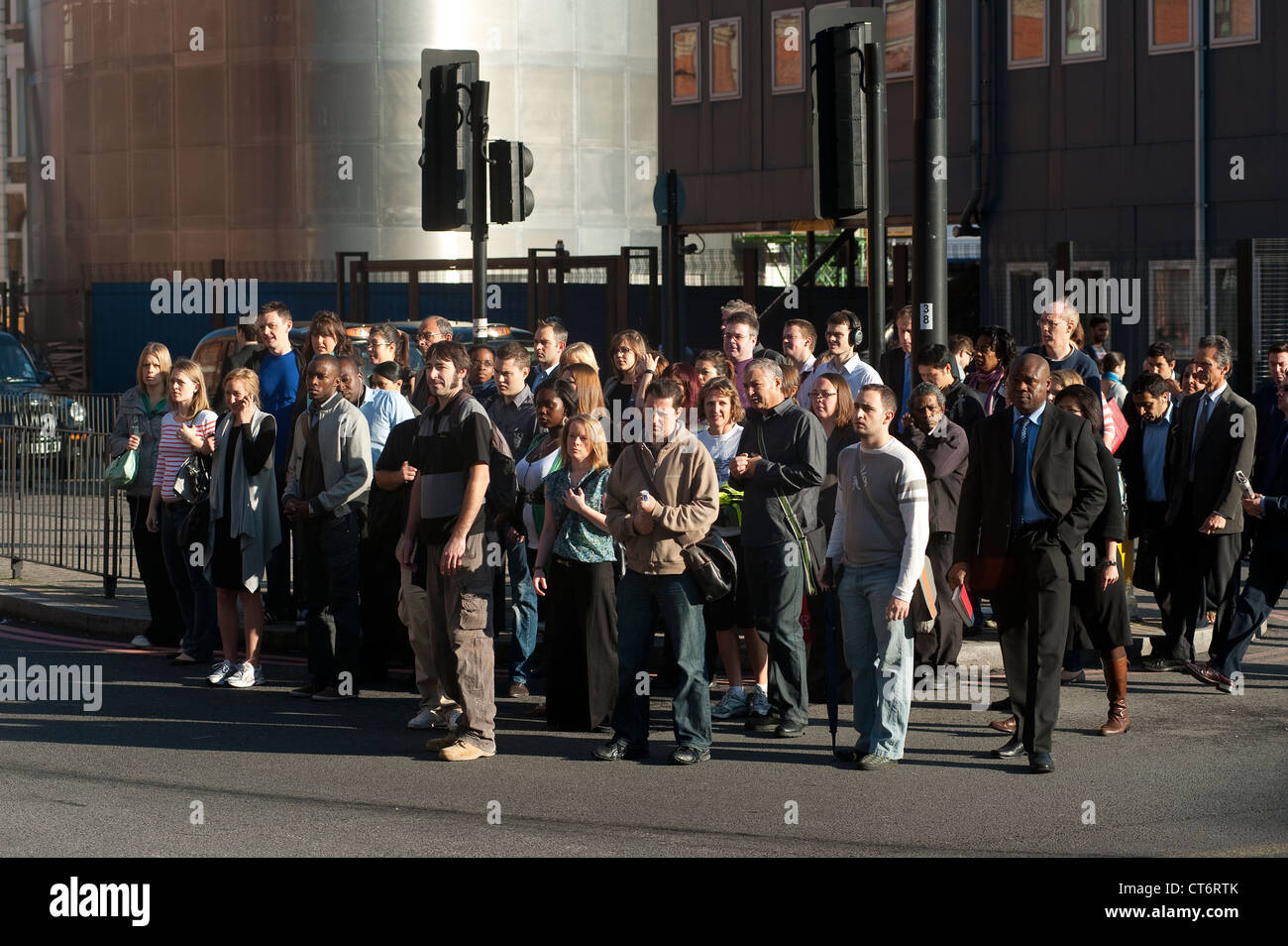 Pedestrians waiting cross street in hi-res stock photography and images ...