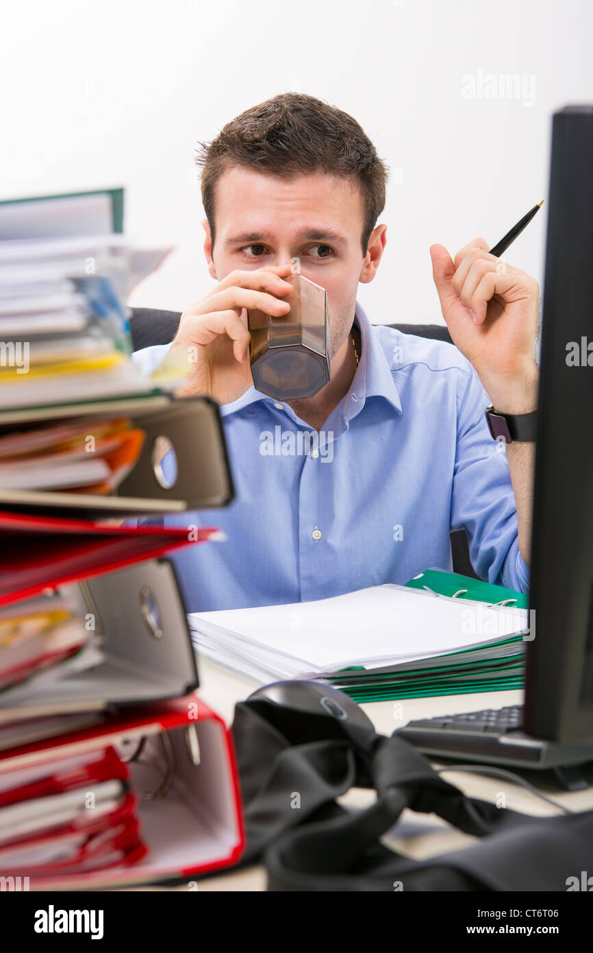 Person computer stack paperwork hi-res stock photography and images - Alamy