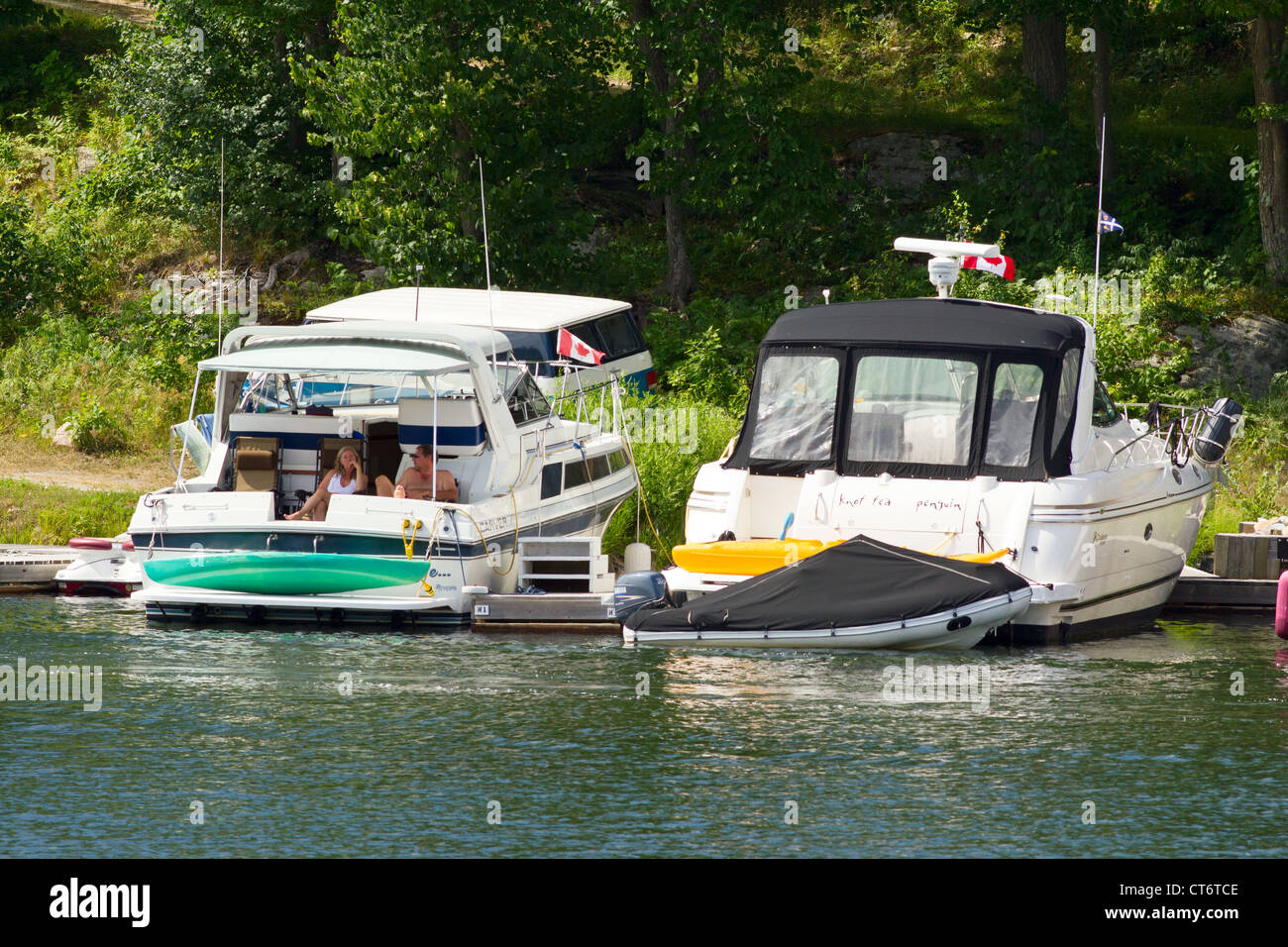 Two boats at the dock Stock Photo - Alamy