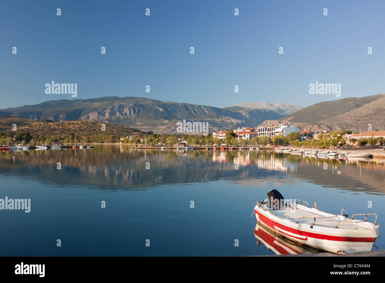 A little port in the town of Itea, central Greece; at the distance, the ...