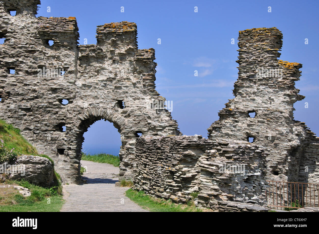An archway with turrets above at Tintagel Castle Cornwall UK Stock ...