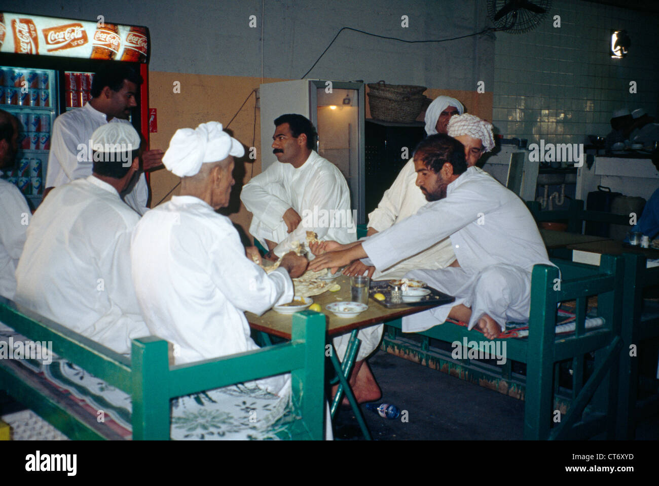 Manama Bahrain Men Eating Meal In Cafe Stock Photo - Alamy