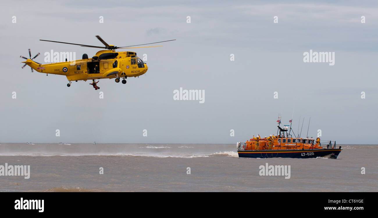 RAF SAR Sea King performing an off-shore rescue exercise with RNLI Tyne ...