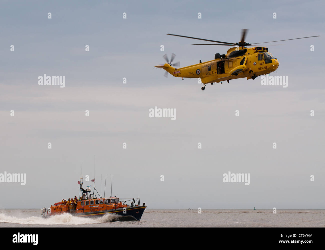RAF SAR Sea King performing an off-shore rescue exercise with RNLI Tyne ...