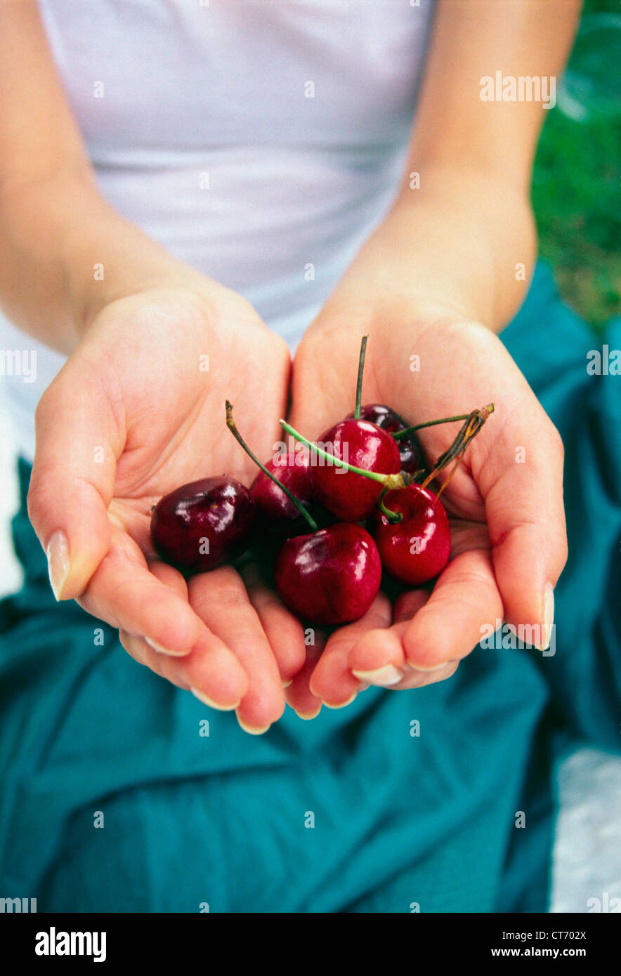 Woman grasping fruit hi-res stock photography and images - Alamy