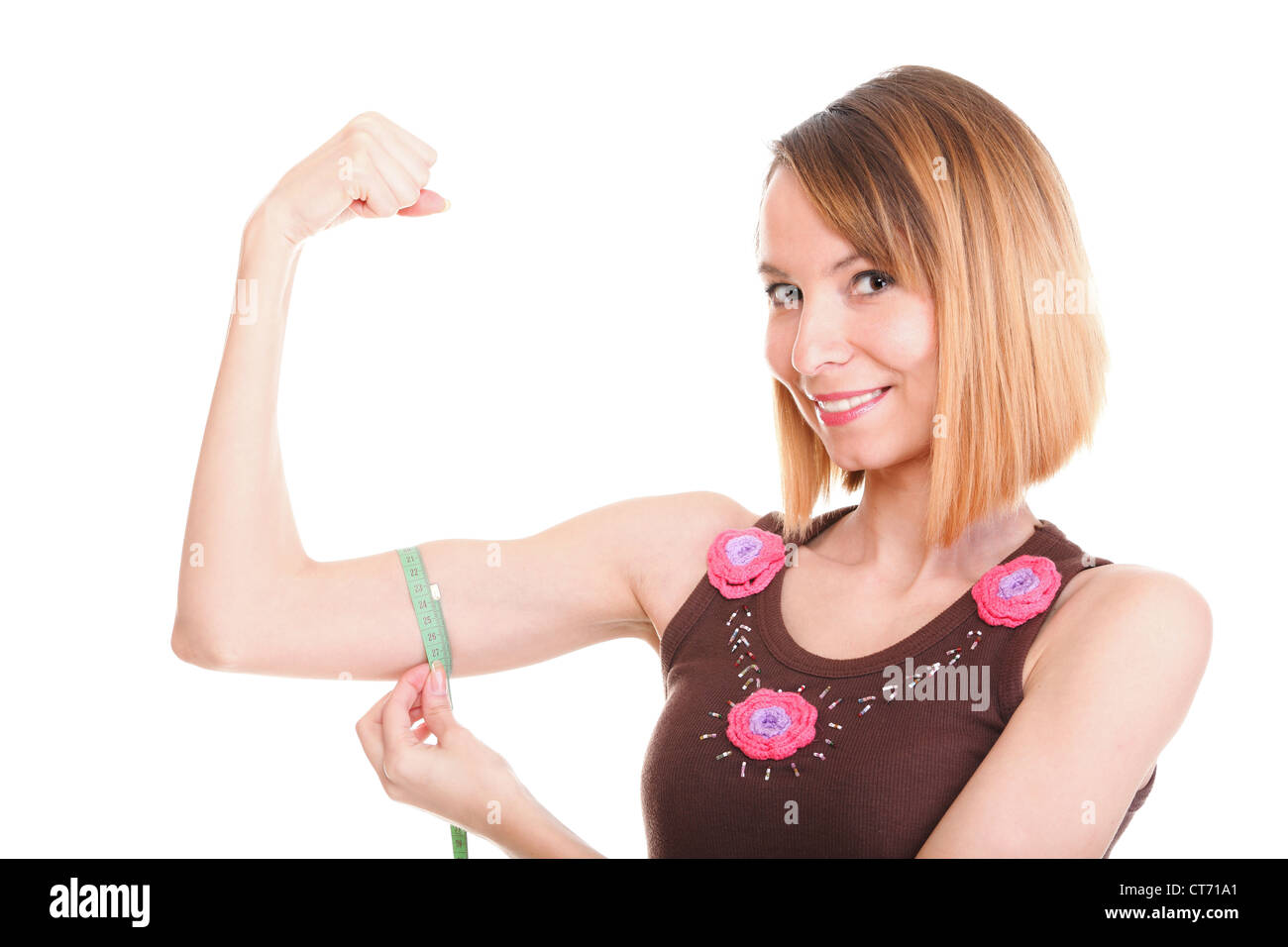 Beautiful young caucasian woman measuring her body with tape, isolated ...