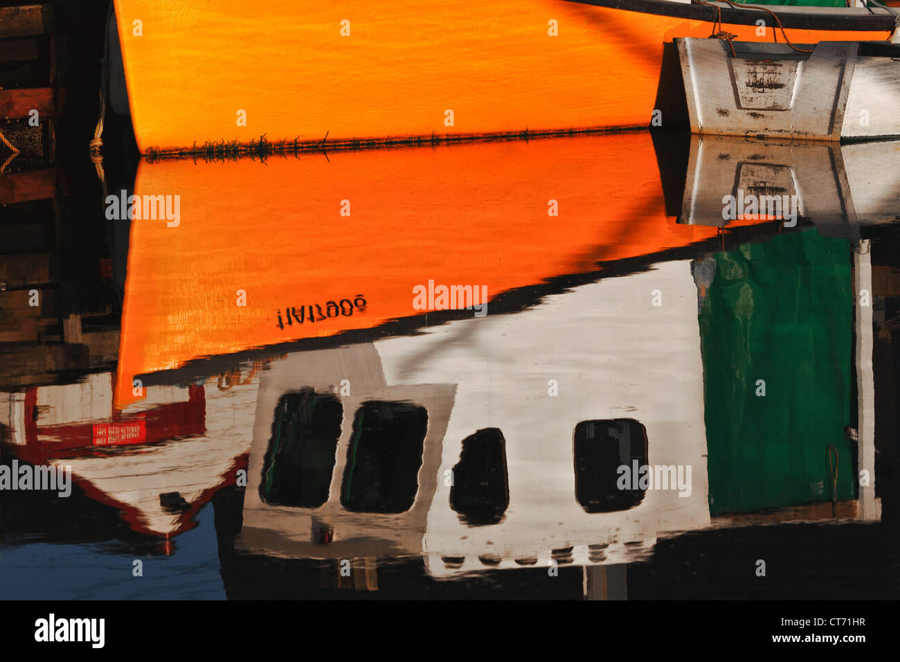 Abstract fishing boat hull and reflection Stock Photo - Alamy