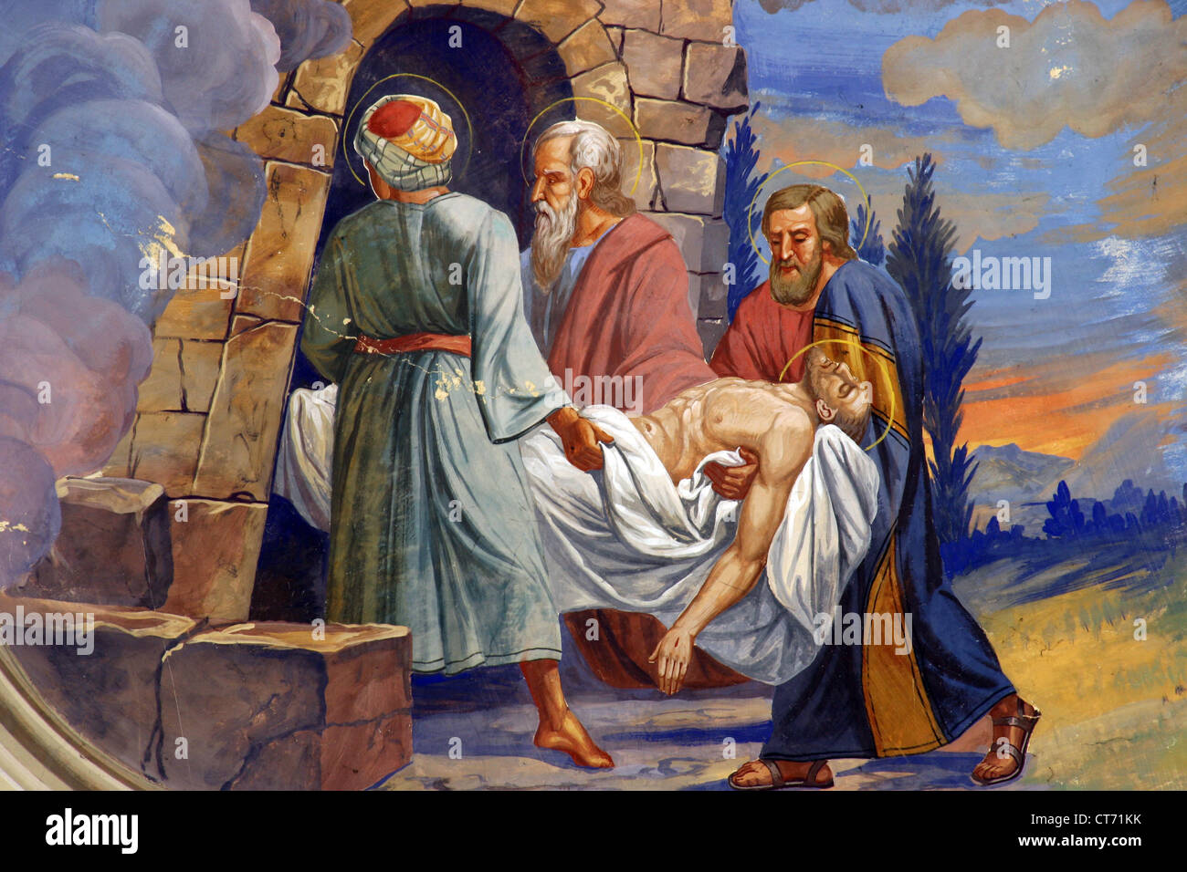 Jesus is laid in the tomb Stock Photo - Alamy