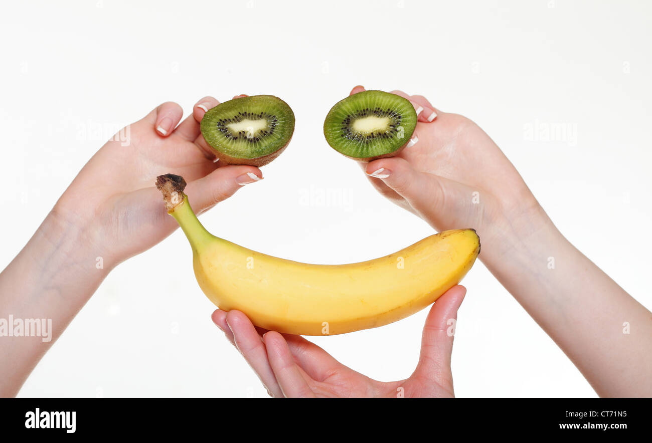 woman hand with kiwi fruit isolated on white Stock Photo - Alamy