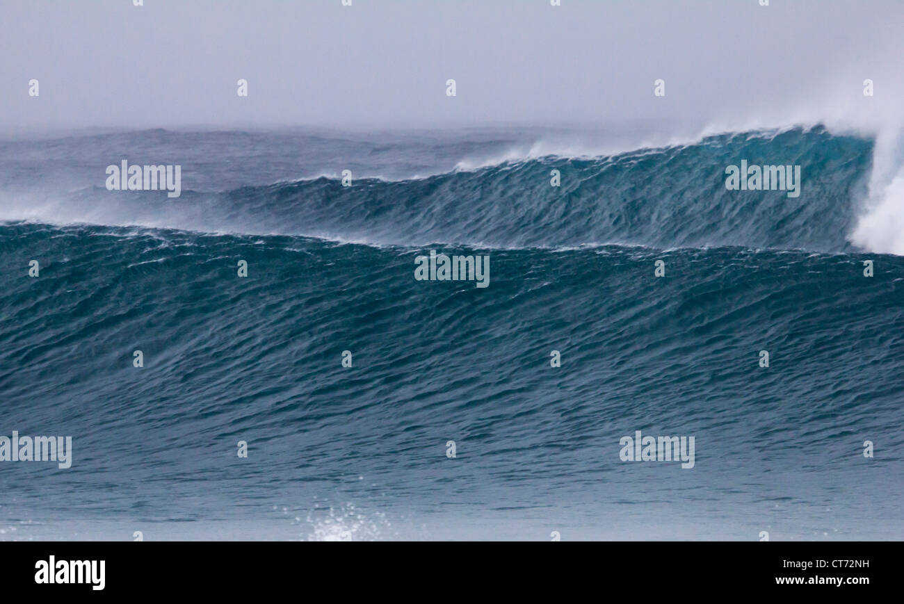 Two large waves in the winter rain Stock Photo - Alamy
