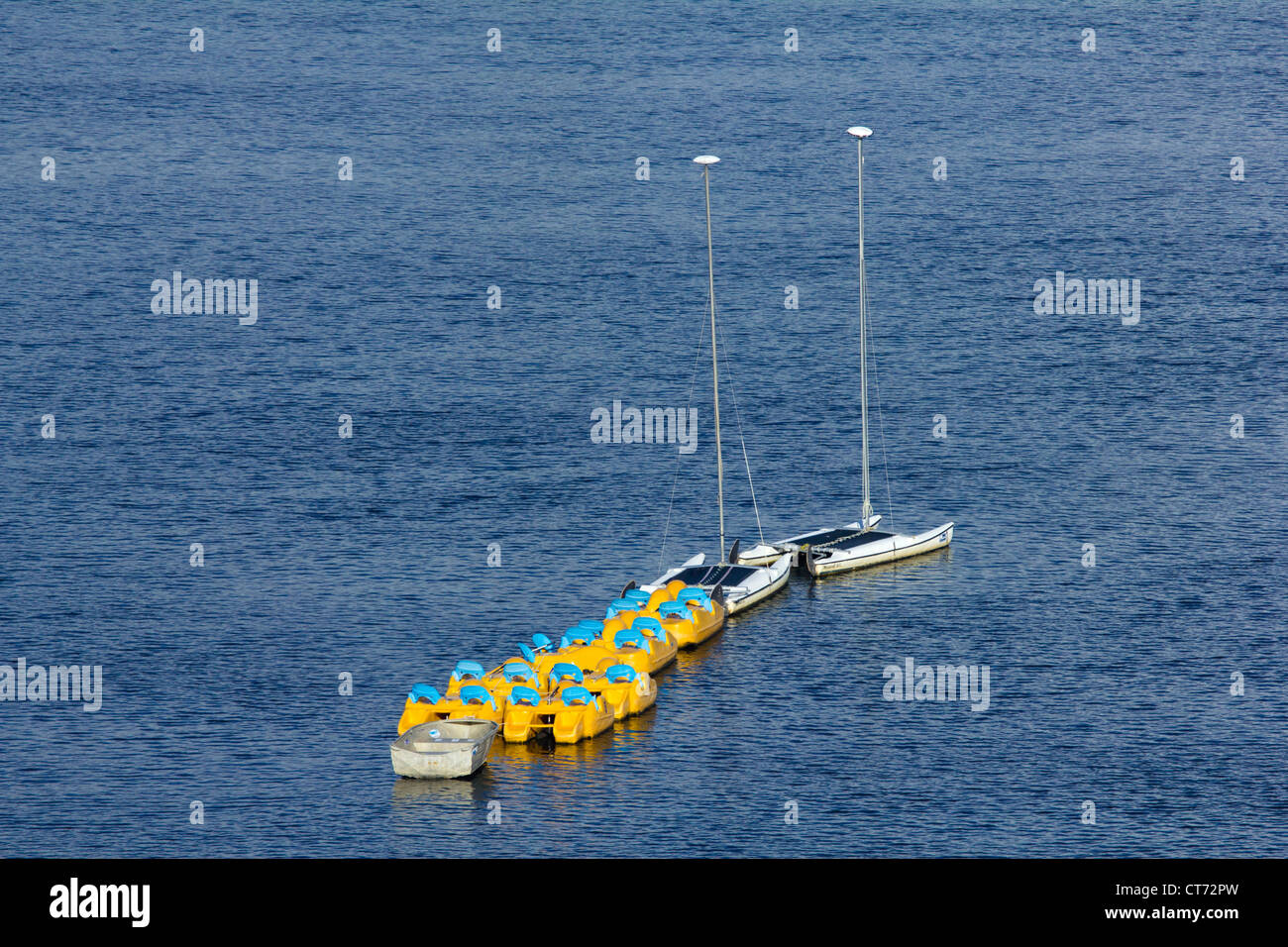 String of boats hi-res stock photography and images - Alamy