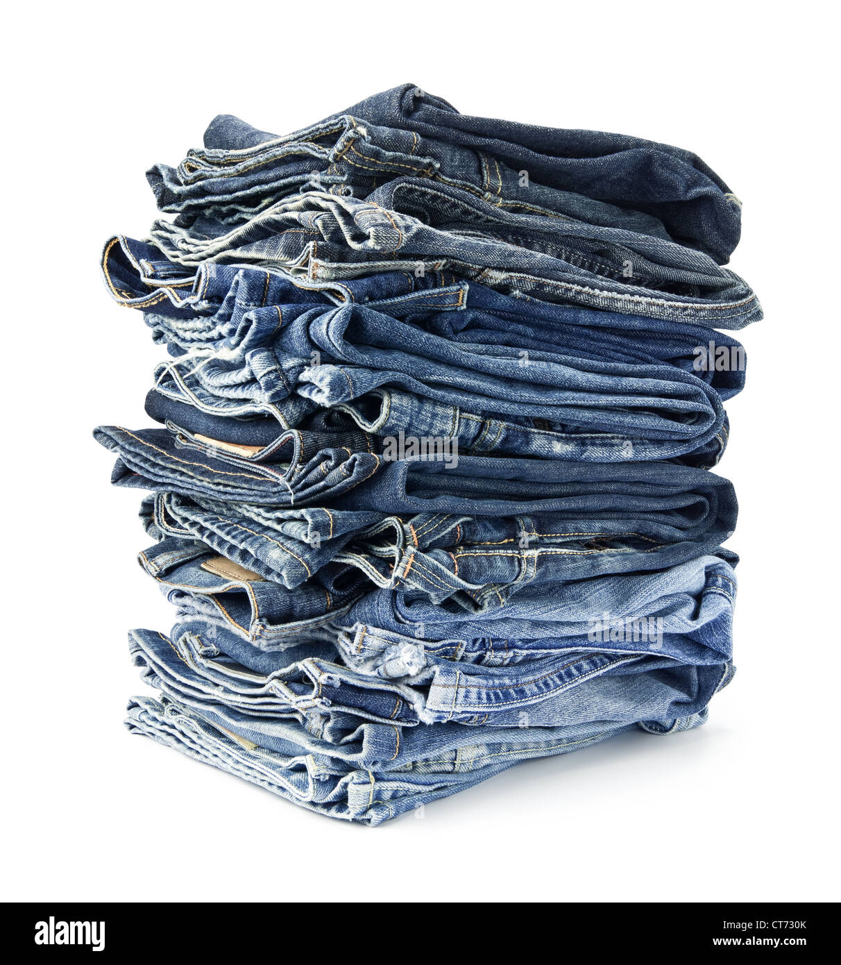 Jeans trousers stack on white background Stock Photo - Alamy
