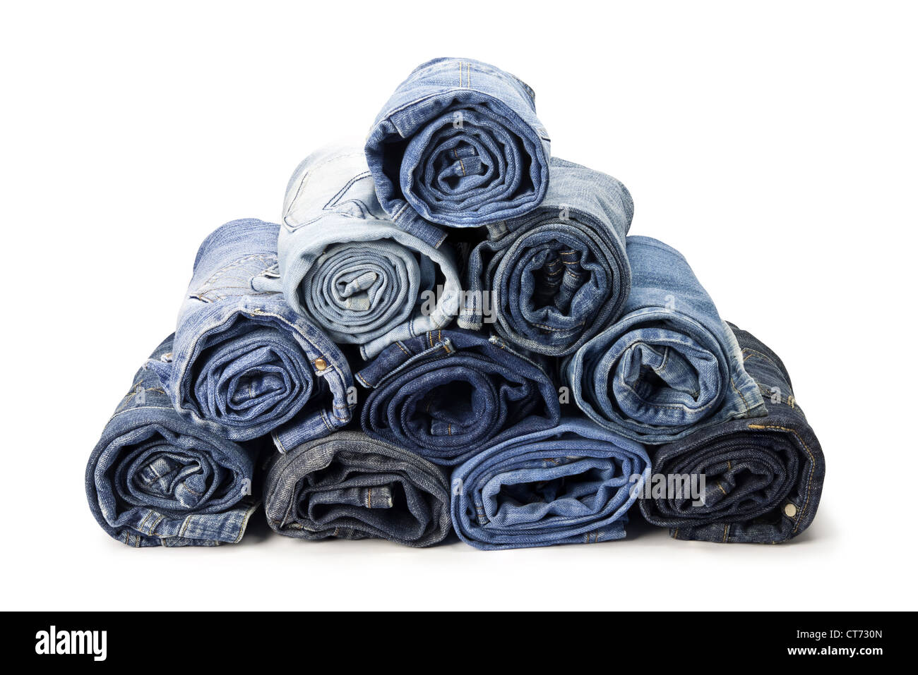 Jeans trousers stack on white background Stock Photo - Alamy