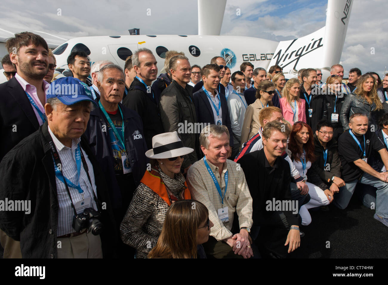 Signed up Virgin Galactic astronauts gather by SpaceShipTwo model for ...