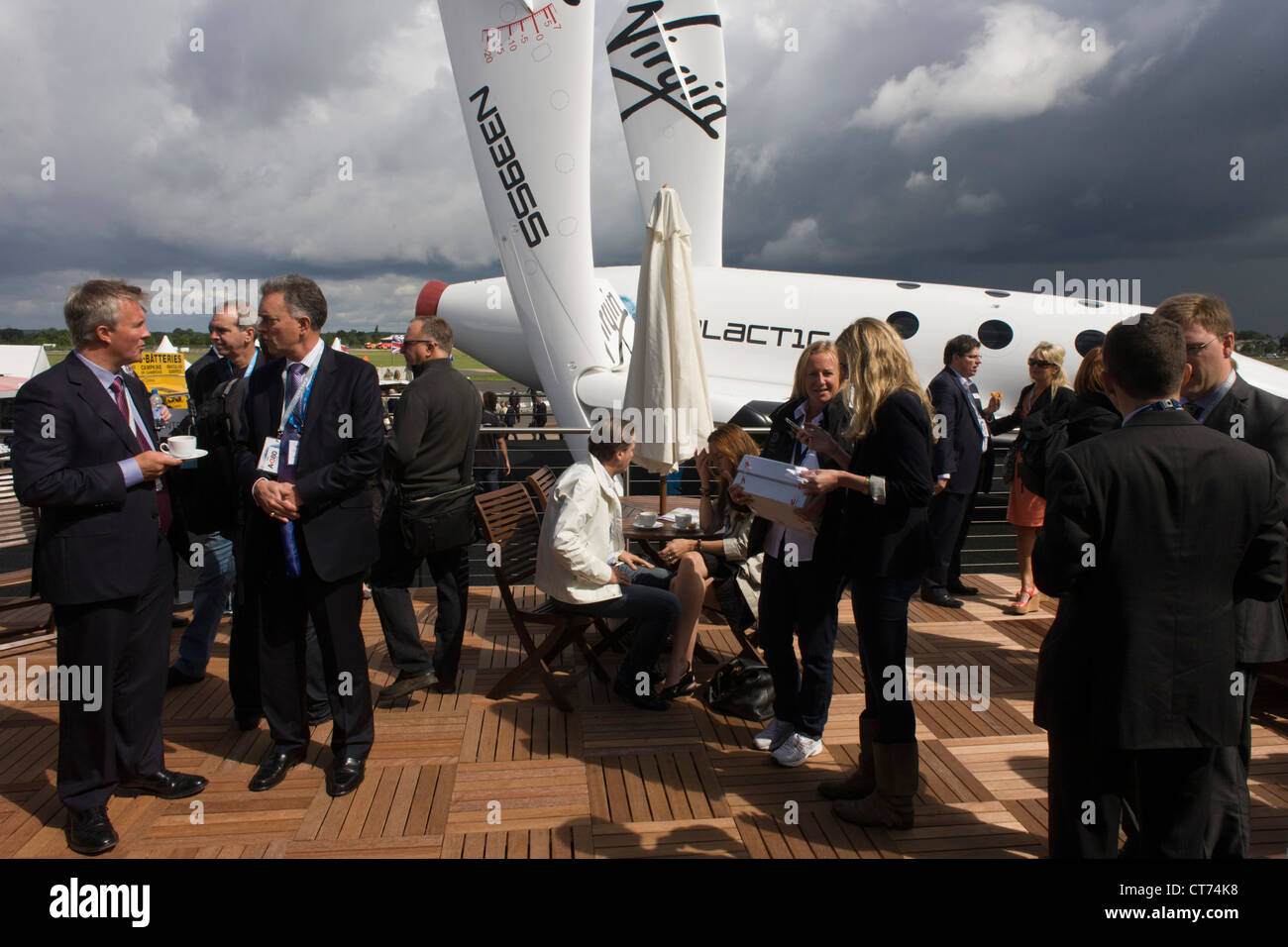 Signed up Virgin Galactic astronauts gather by SpaceShipTwo model for ...