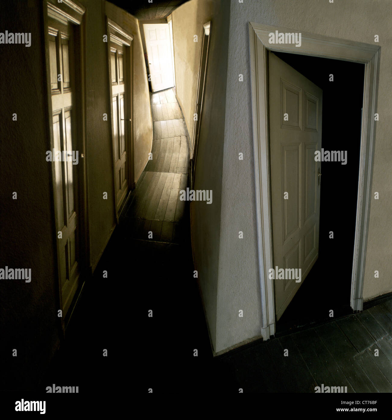 Open and closed doors in a hallway Stock Photo - Alamy