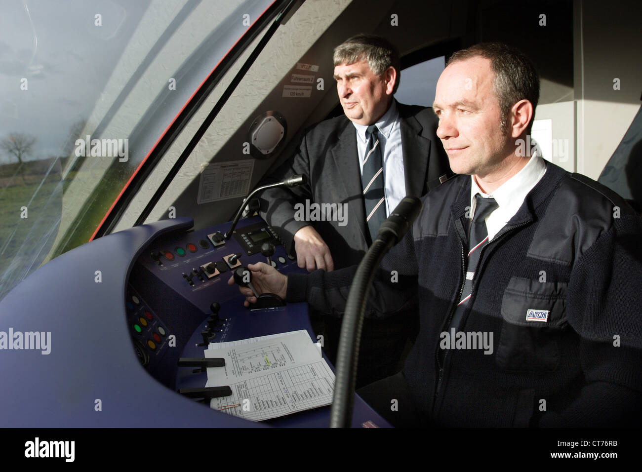Train engineers in the train of the AKN Stock Photo - Alamy