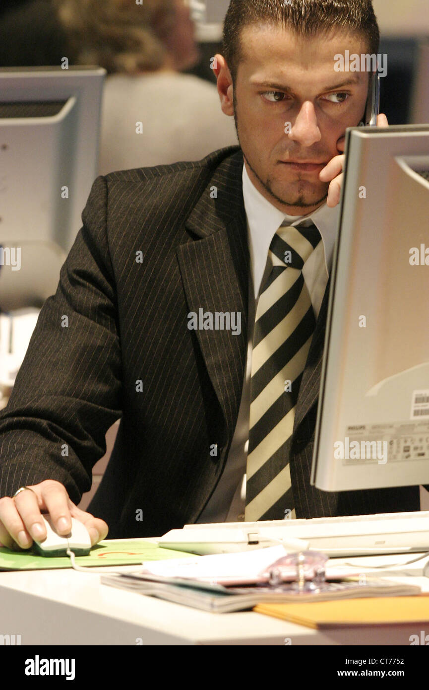 ITB Berlin, TUI employees at a computer Stock Photo - Alamy