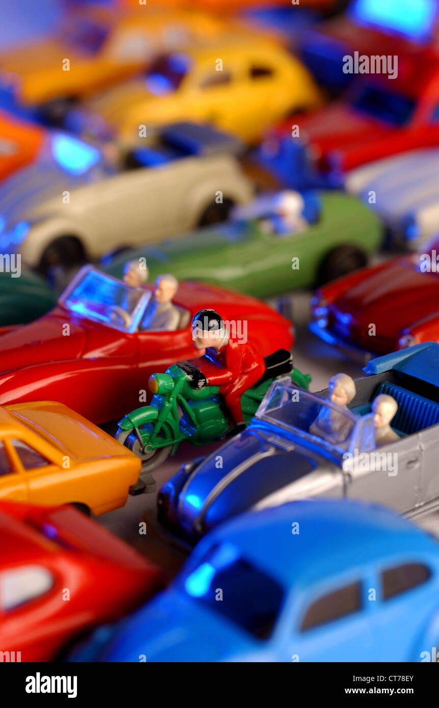 Wiking model cars, motorcyclists in traffic Stock Photo - Alamy