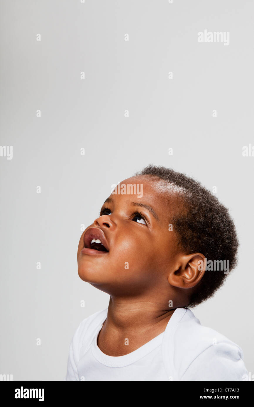 Boy looking up Stock Photo - Alamy