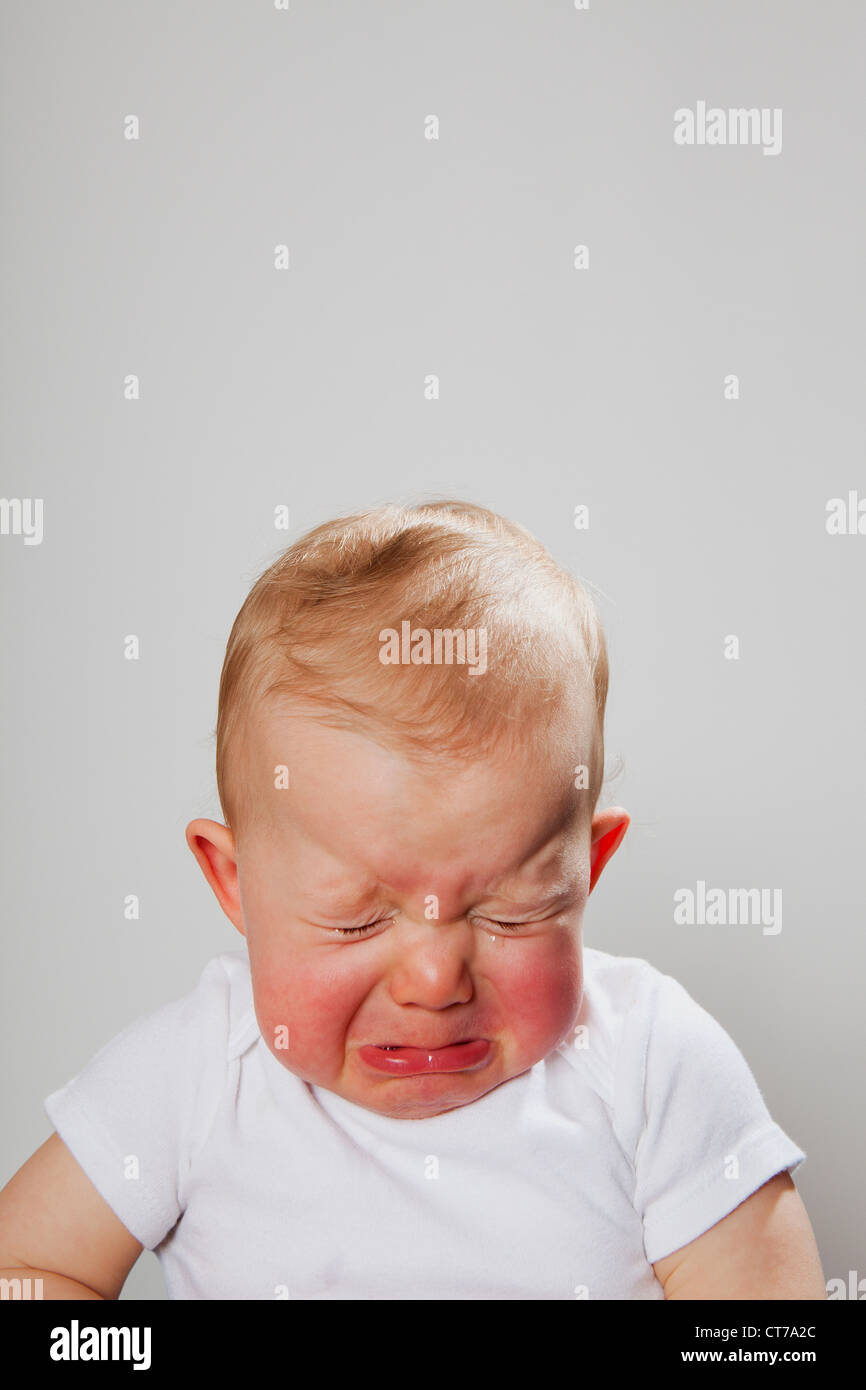 Baby boy crying Stock Photo - Alamy
