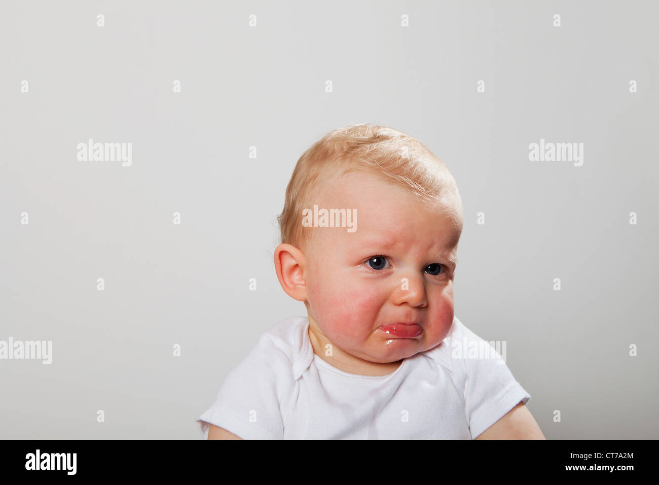 Crying baby white background hi-res stock photography and images - Alamy