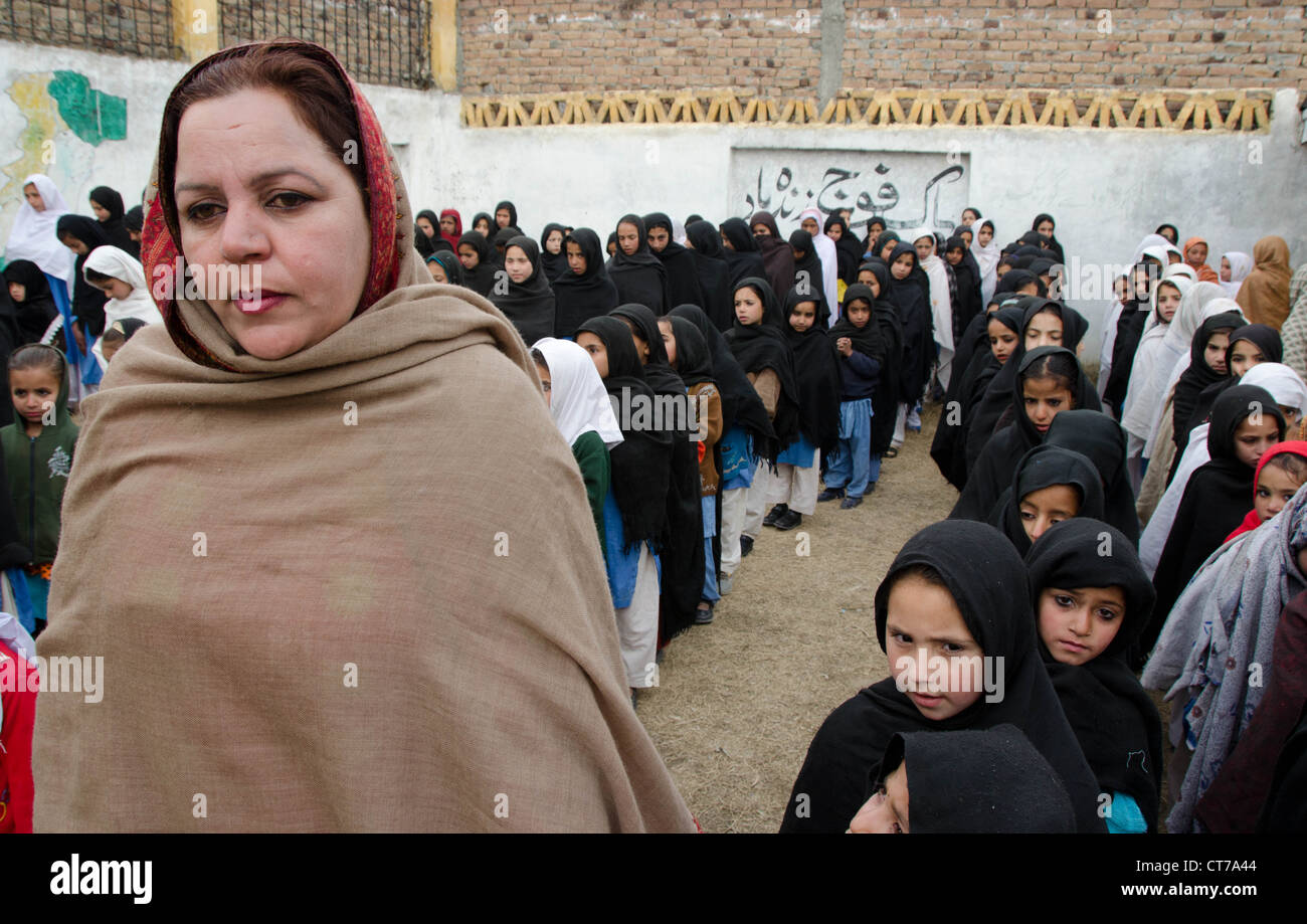 Female teacher with girl students in Swat Valley, Pakistan Stock Photo ...