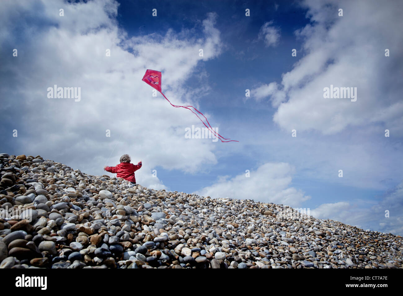 Boy On Pebble Beach High Resolution Stock Photography and Images - Alamy