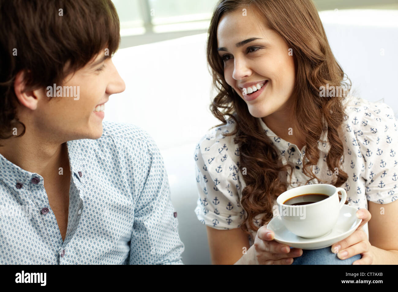Happy couple looking at each other with affection Stock Photo - Alamy