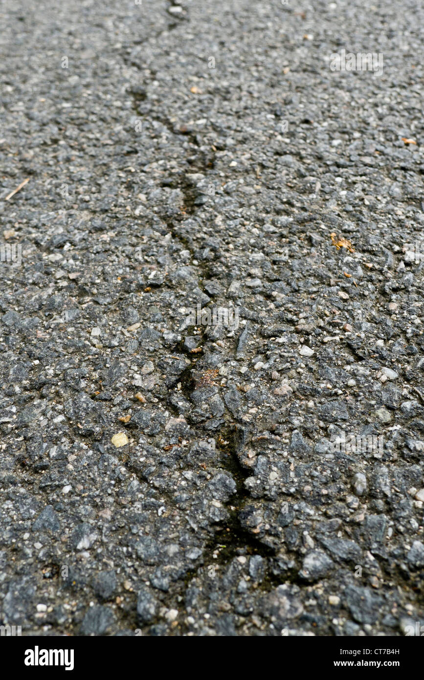 cracked asphalt, low angle view Stock Photo - Alamy
