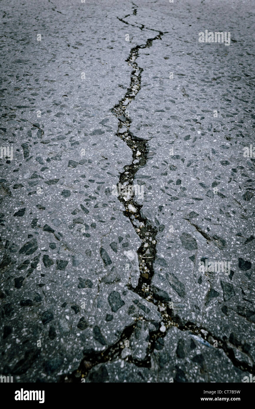 cracked asphalt, low angle view Stock Photo - Alamy