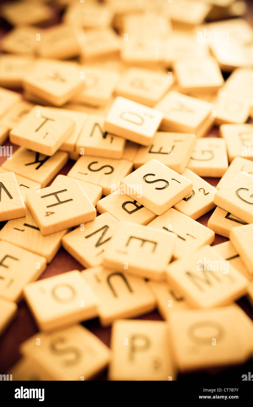 scrabble tiles scattered Stock Photo - Alamy
