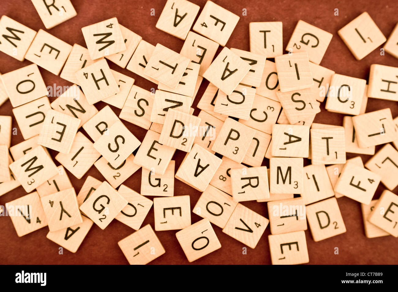 scrabble tiles scattered, view from above Stock Photo - Alamy