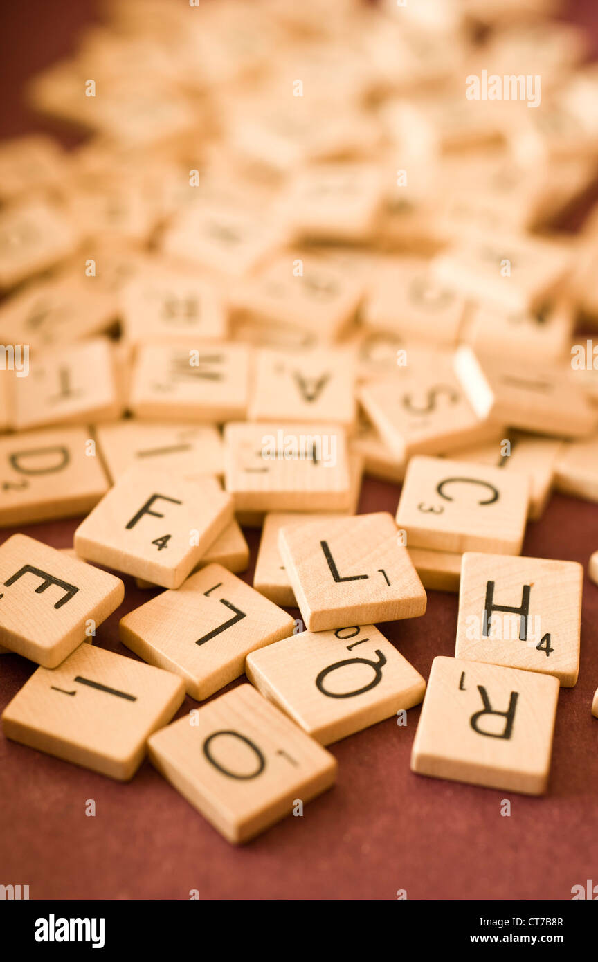 scrabble tiles scattered Stock Photo - Alamy
