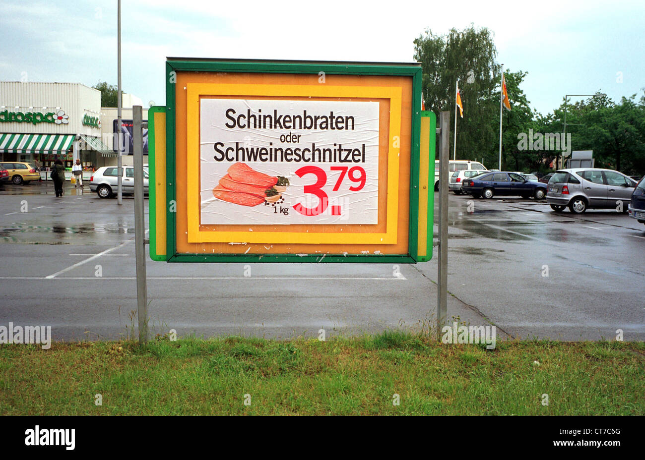 Berlin, billboard with an offer for meat products Stock Photo - Alamy