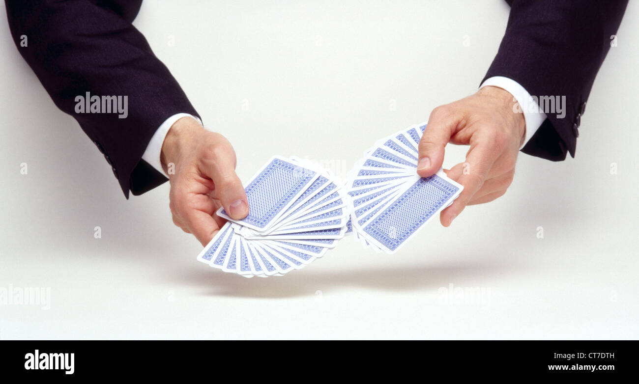 Close up of hands mix the cards Stock Photo - Alamy