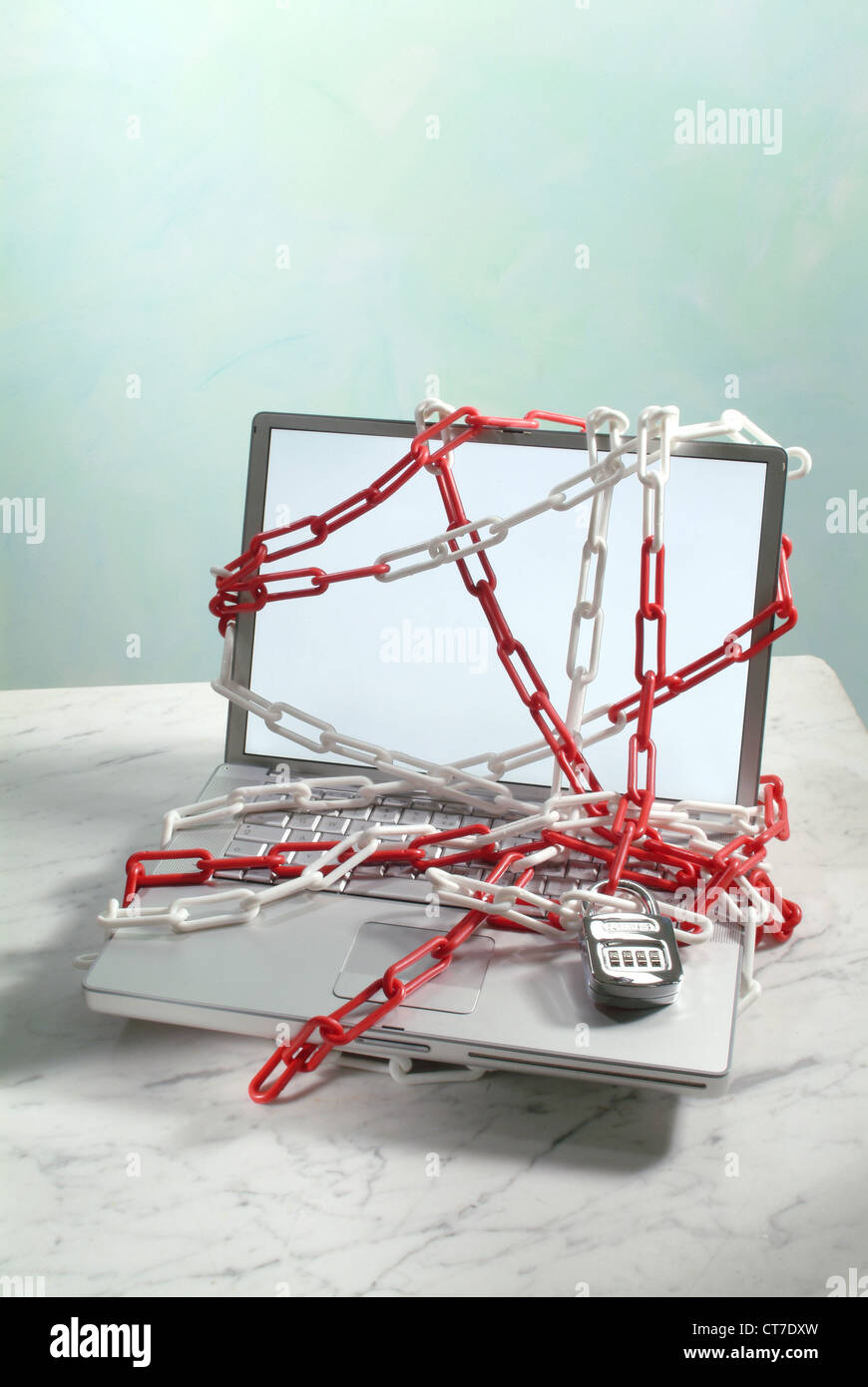 A wrapped with a chain laptop Stock Photo - Alamy