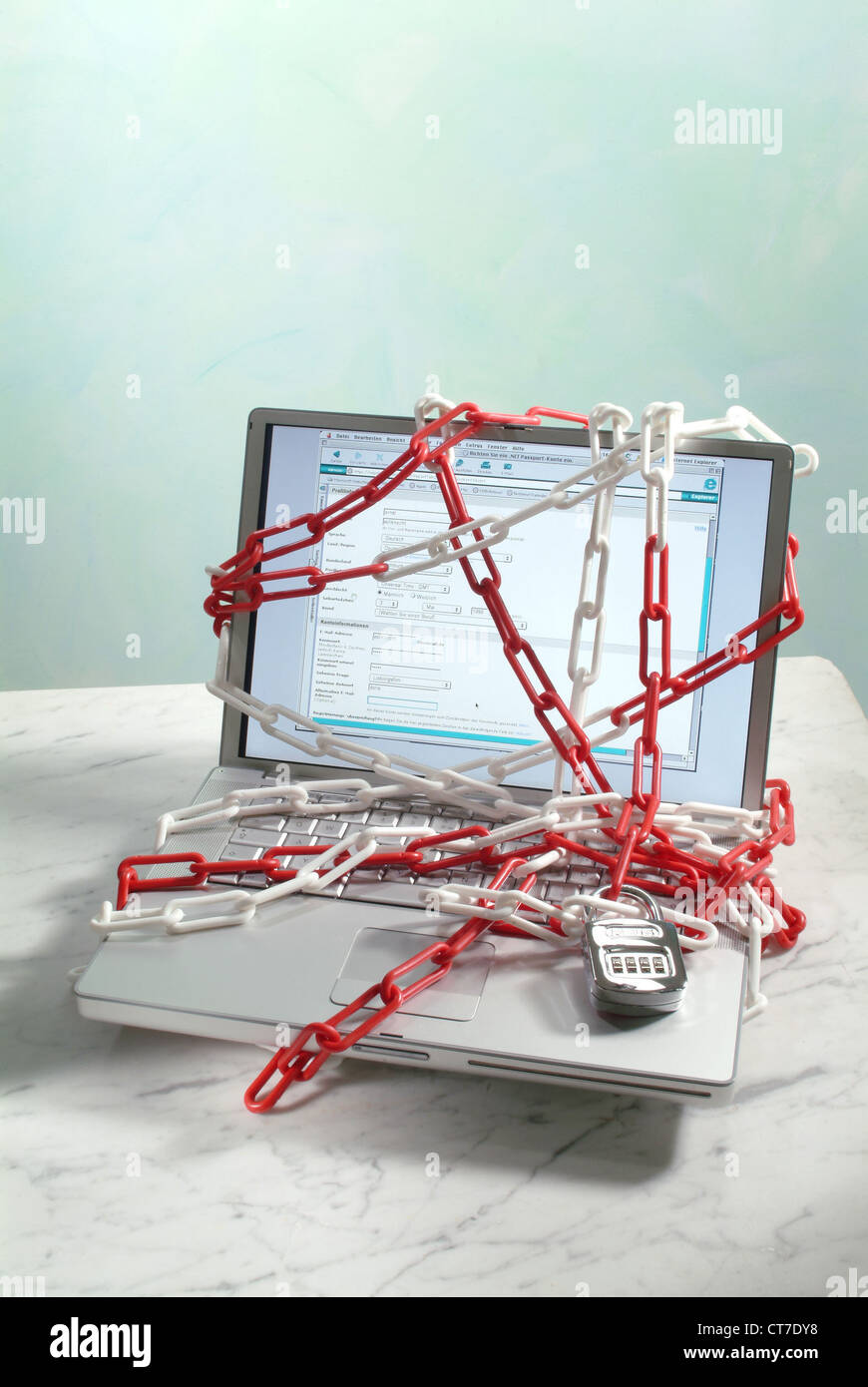 A wrapped with a chain laptop Stock Photo - Alamy