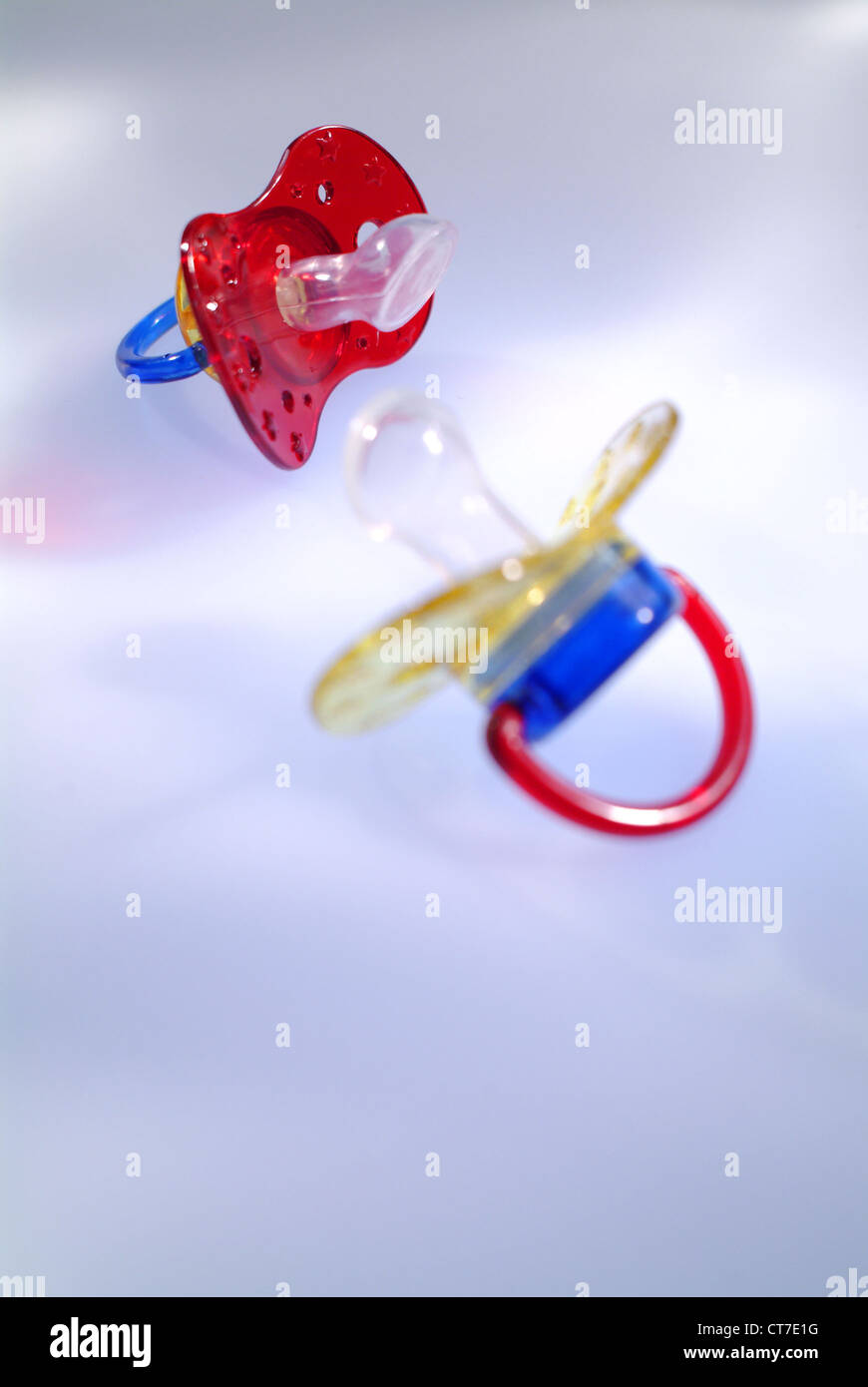 Sucking pacifiers hi-res stock photography and images - Alamy