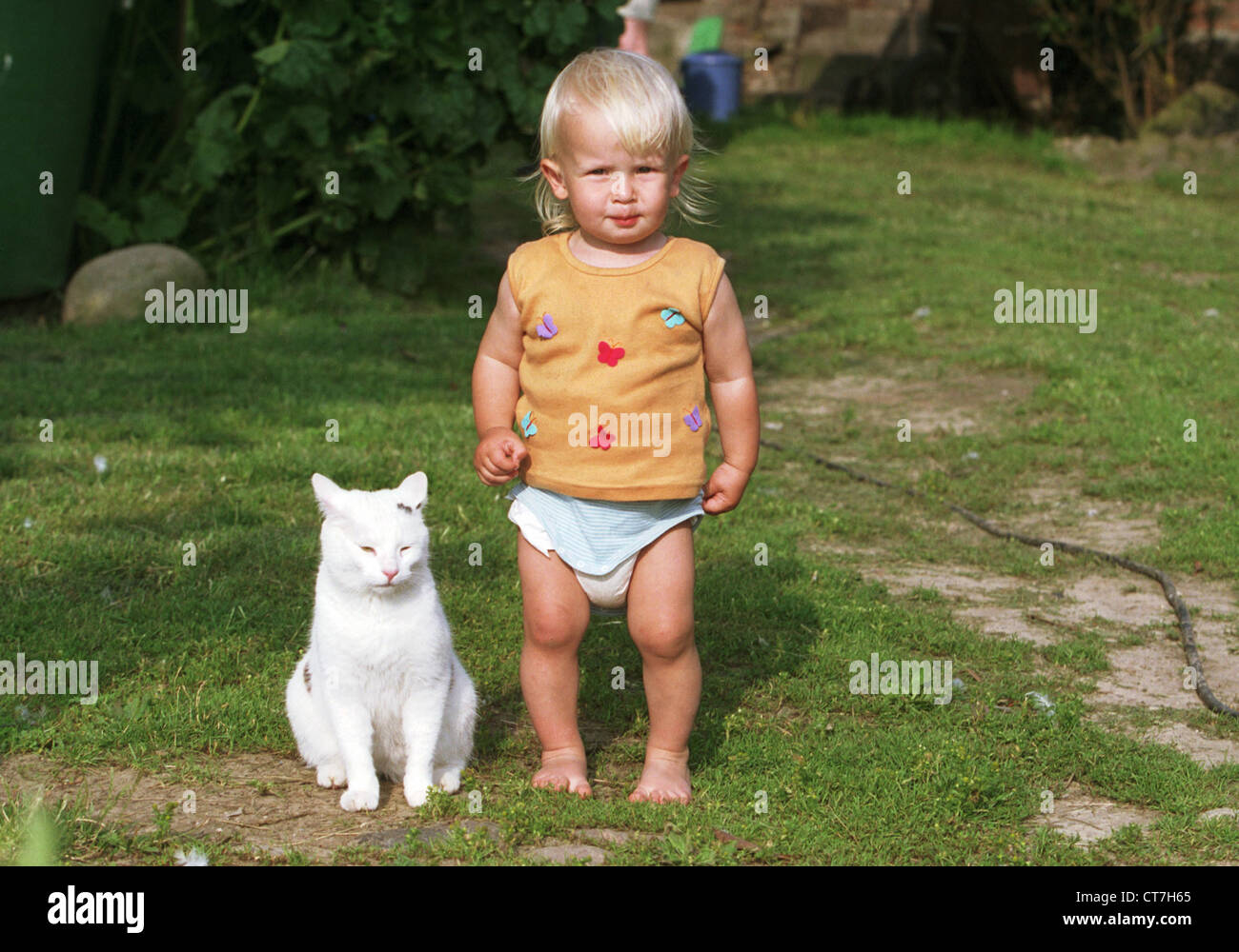 Child with cat Stock Photo - Alamy