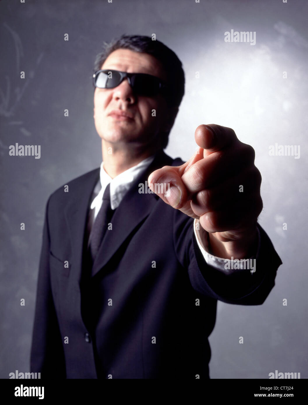 A man points his index finger to the viewer Stock Photo - Alamy