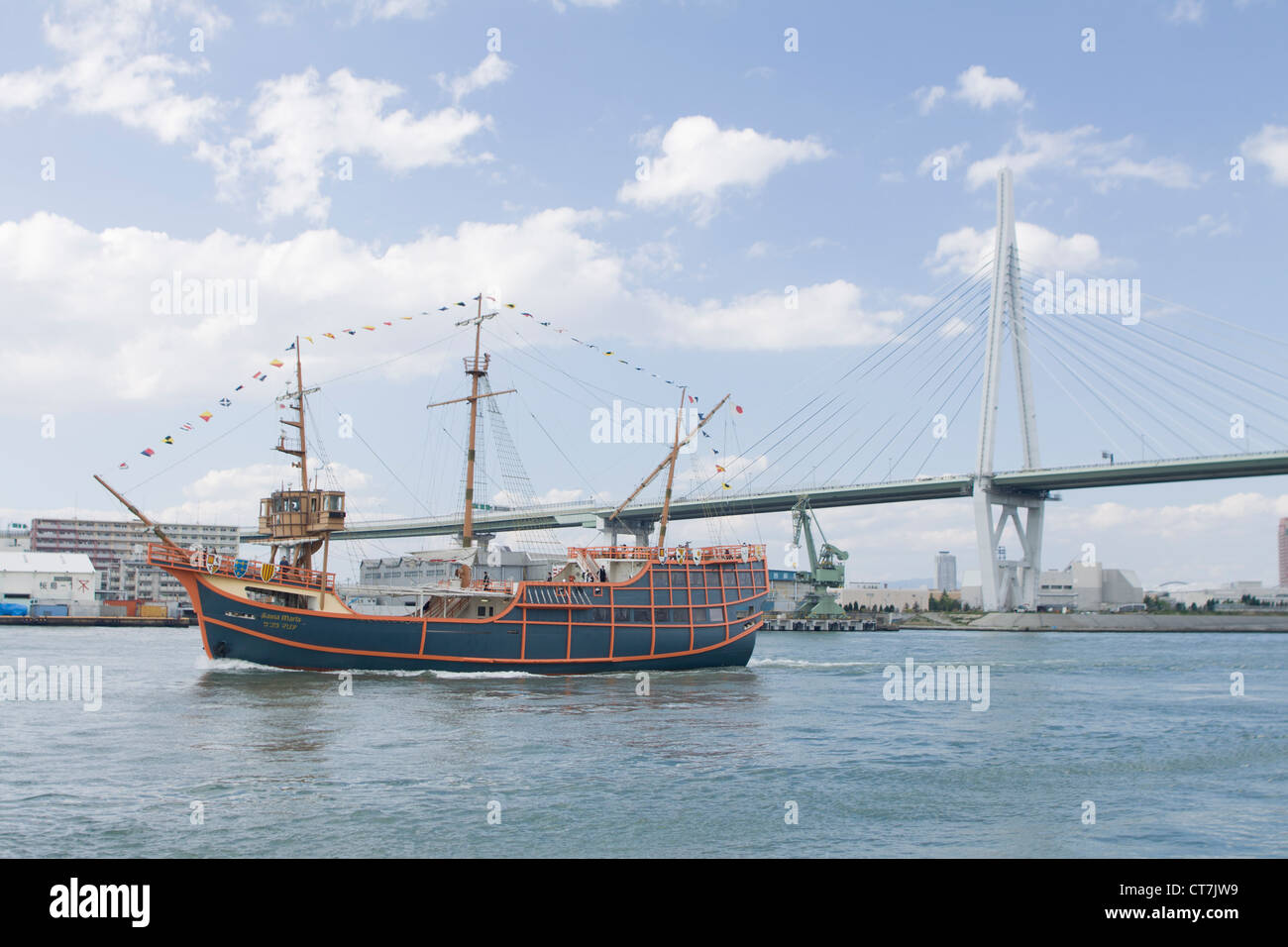 A old style ship sails out of the port of Osaka, Japan Stock Photo - Alamy