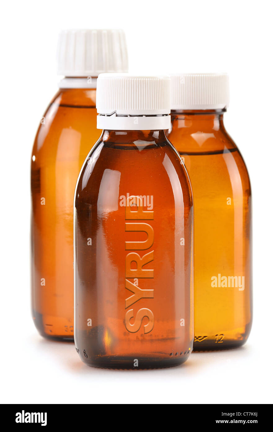 Bottles of syrup medication on white background Stock Photo - Alamy