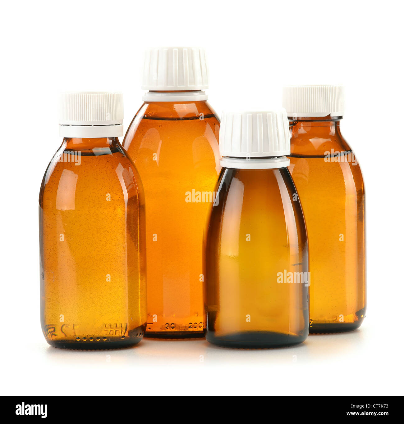 Bottles of syrup medication on white background Stock Photo - Alamy